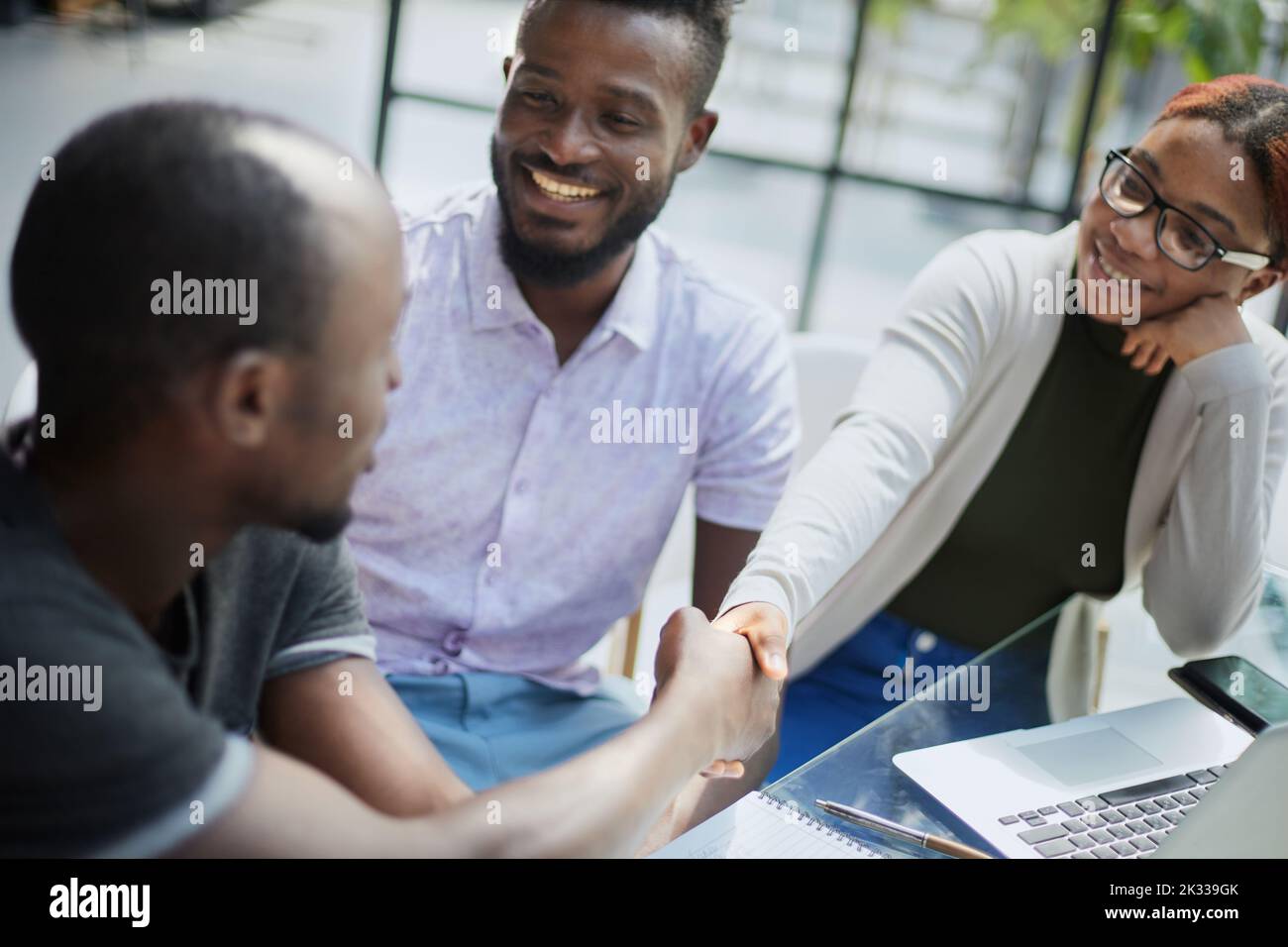 business people handshaking at modern light office Stock Photo - Alamy