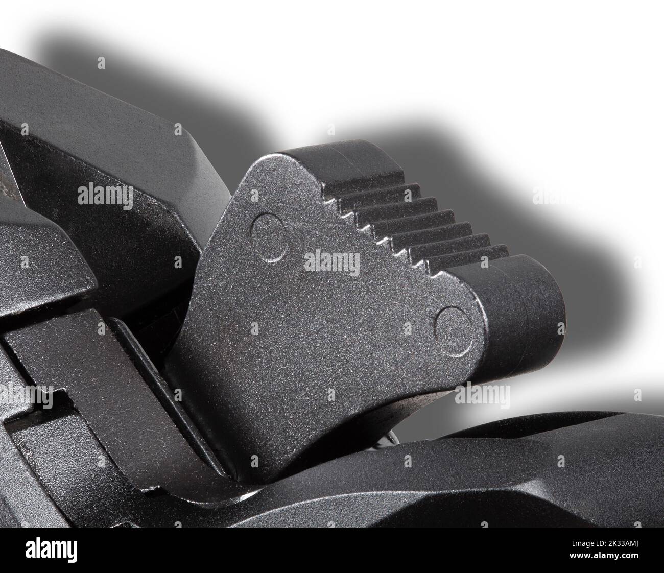 Hammer on a semi-auto pistol with its shadow behind Stock Photo - Alamy