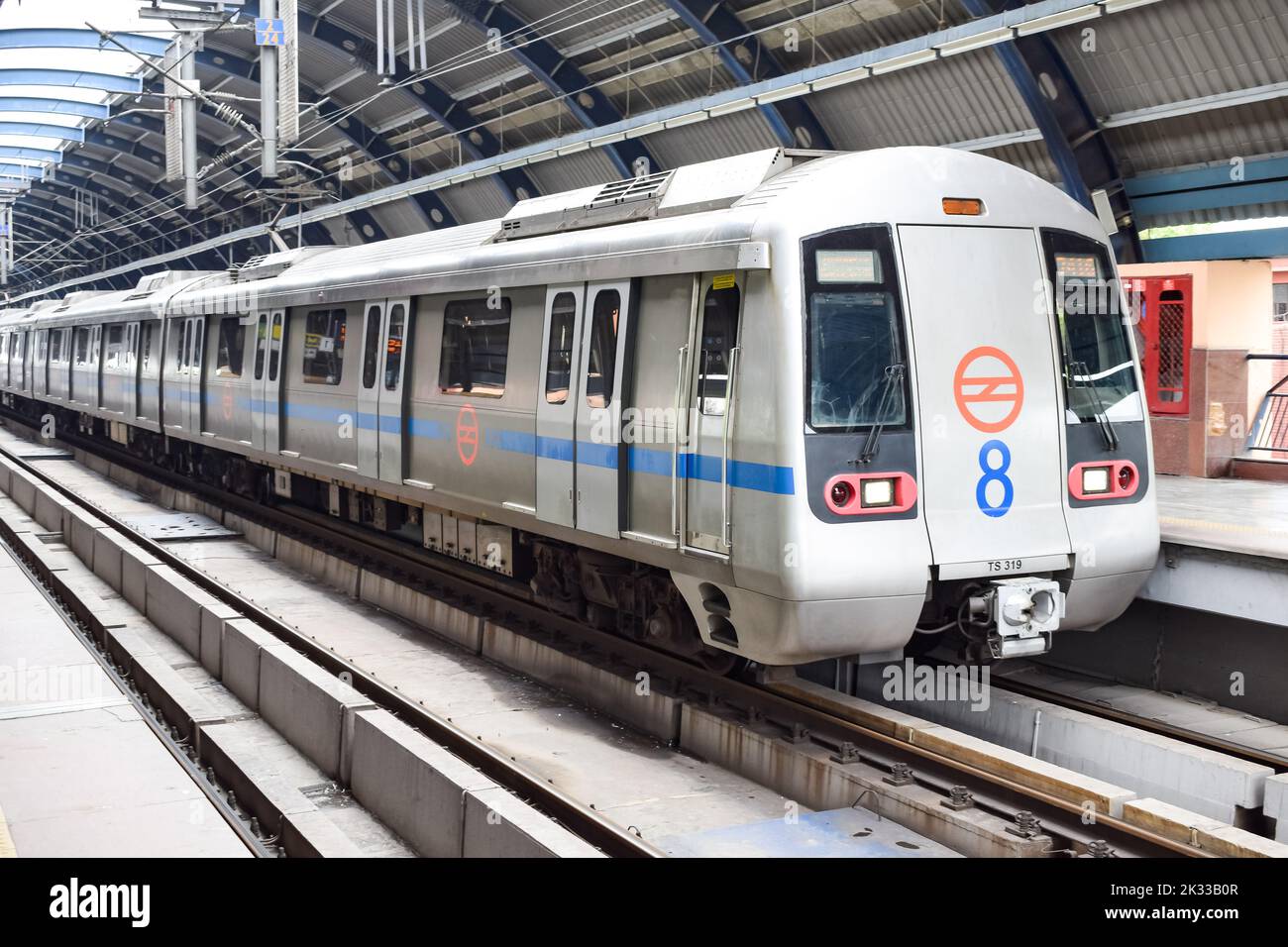 Delhi Metro train arriving at Jhandewalan metro station in New Delhi ...
