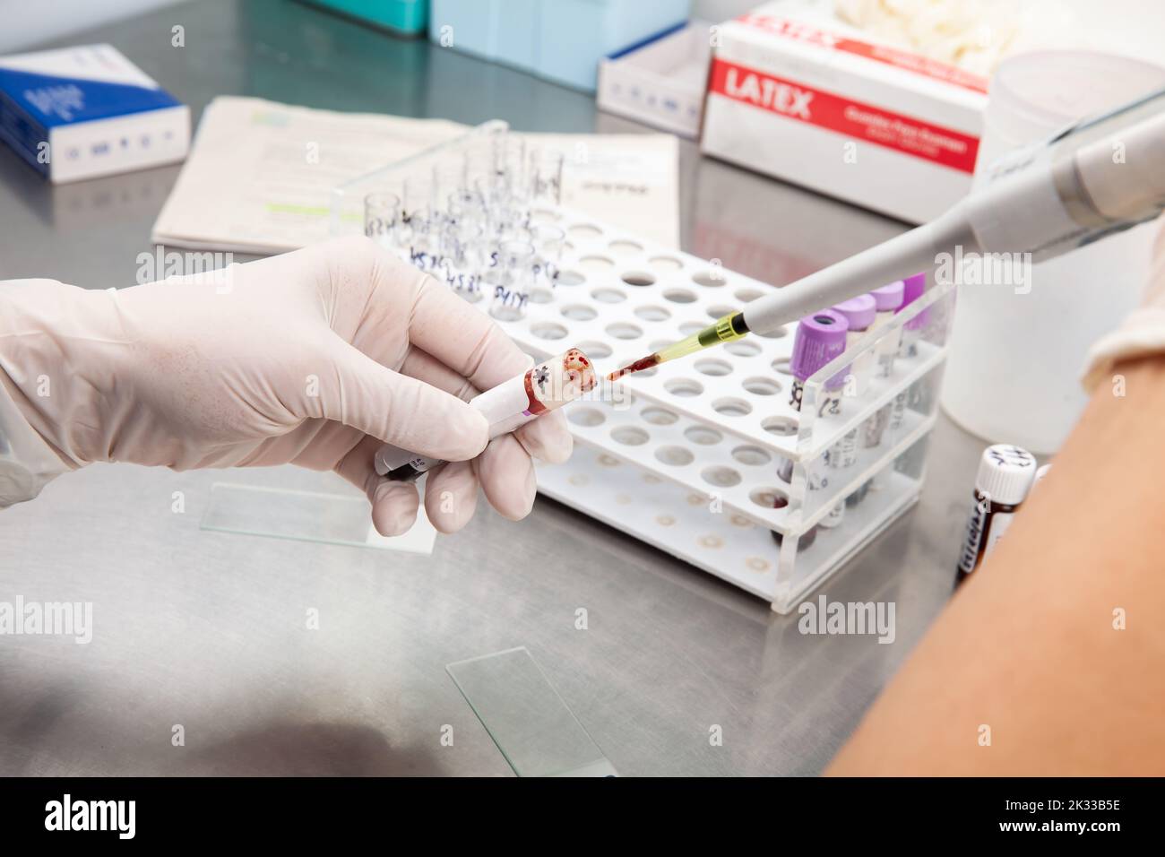 Scientist preparing samples for flow cytometric analysis in the ...