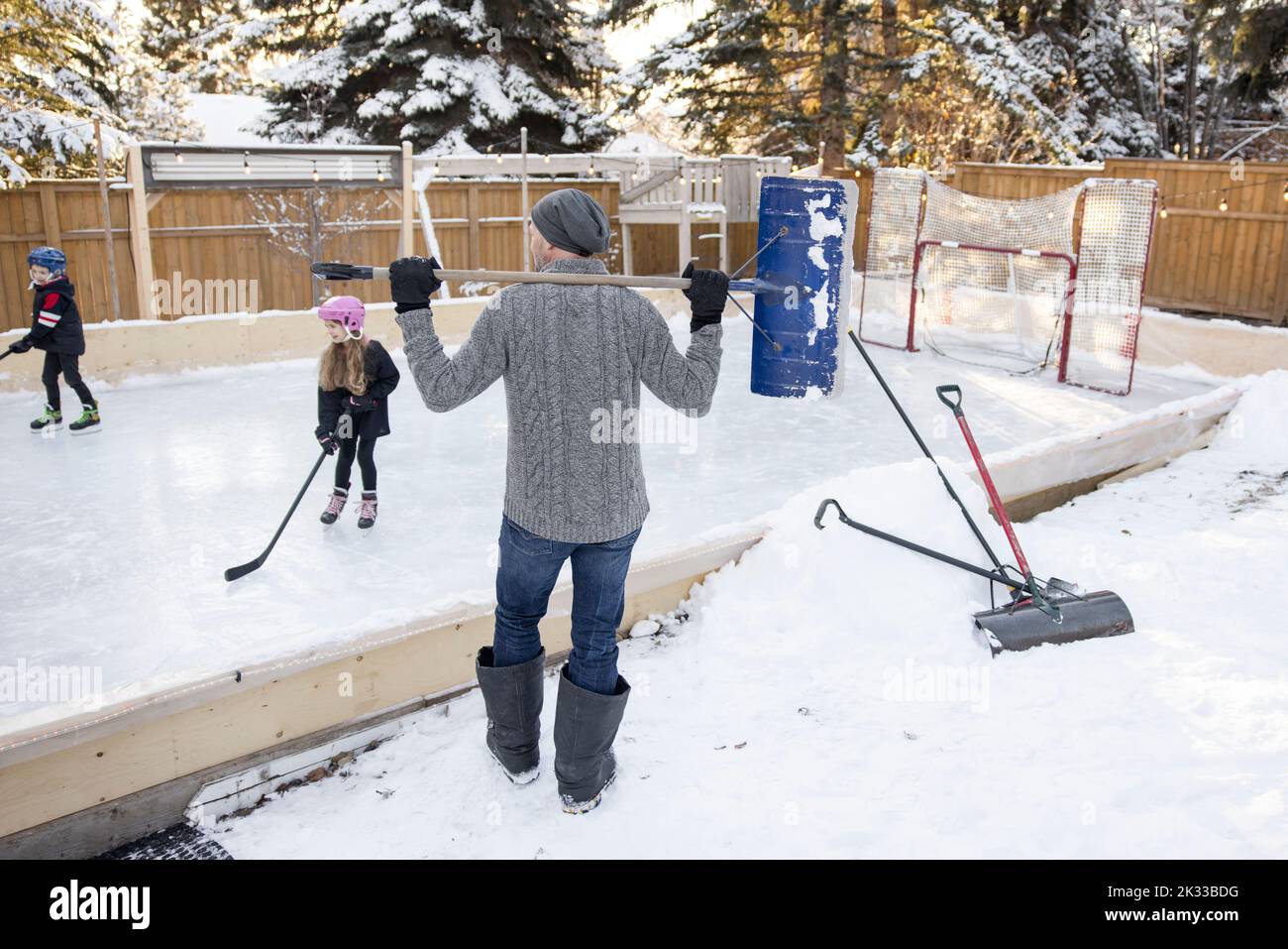 Father child play snow hi-res stock photography and images - Alamy