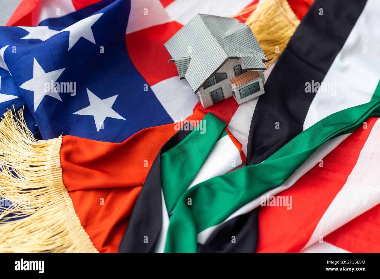 USA and UAE flags and toy house Stock Photo - Alamy
