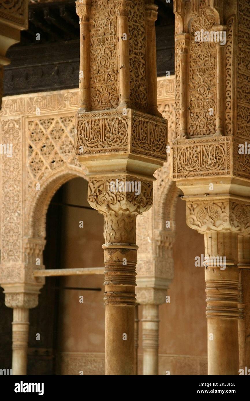 A vertical shot of the columns of Alhambra palace in Granada Stock ...