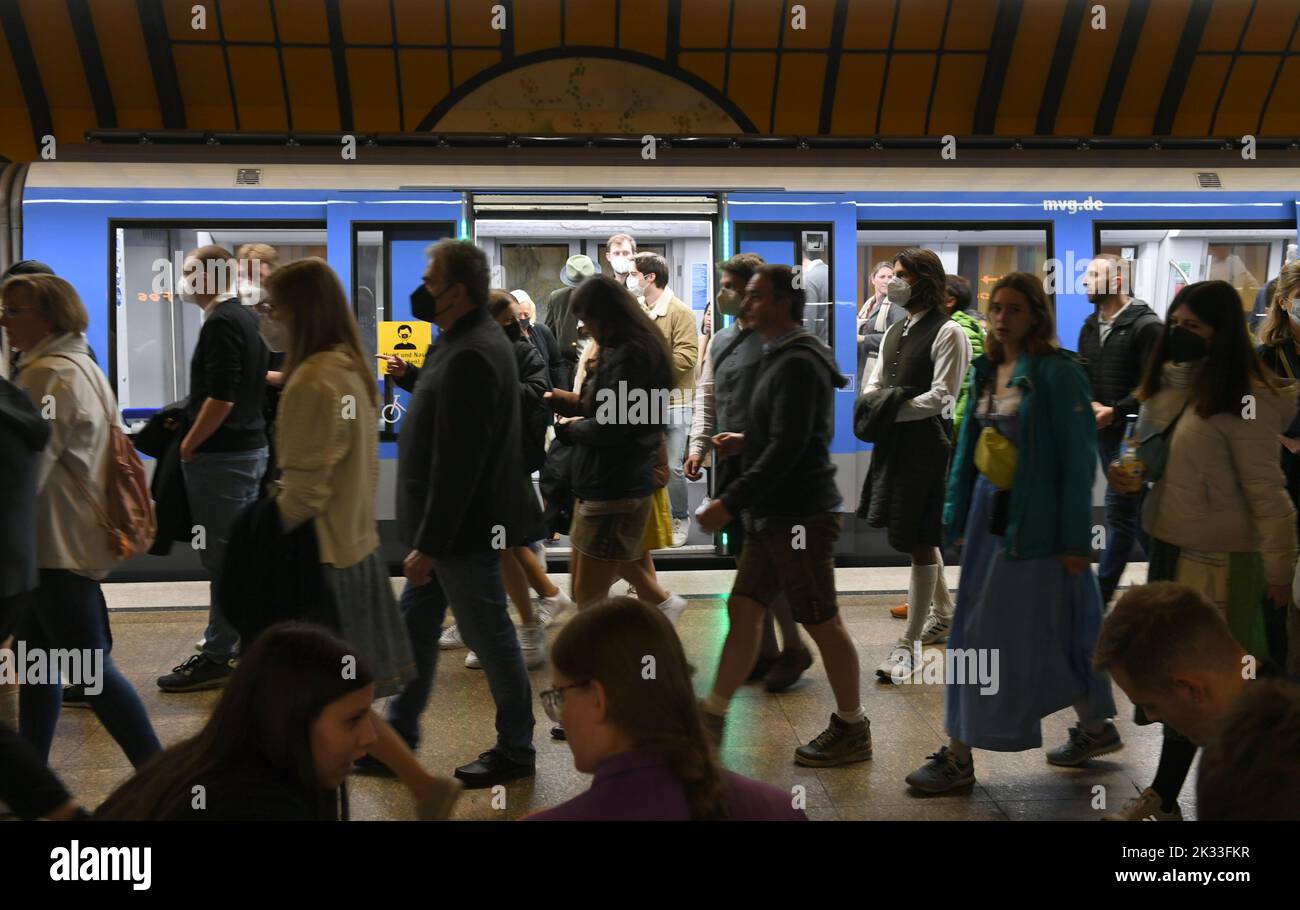 Munich, Germany. 24th Sep, 2022. Subway passengers go to the exit ...