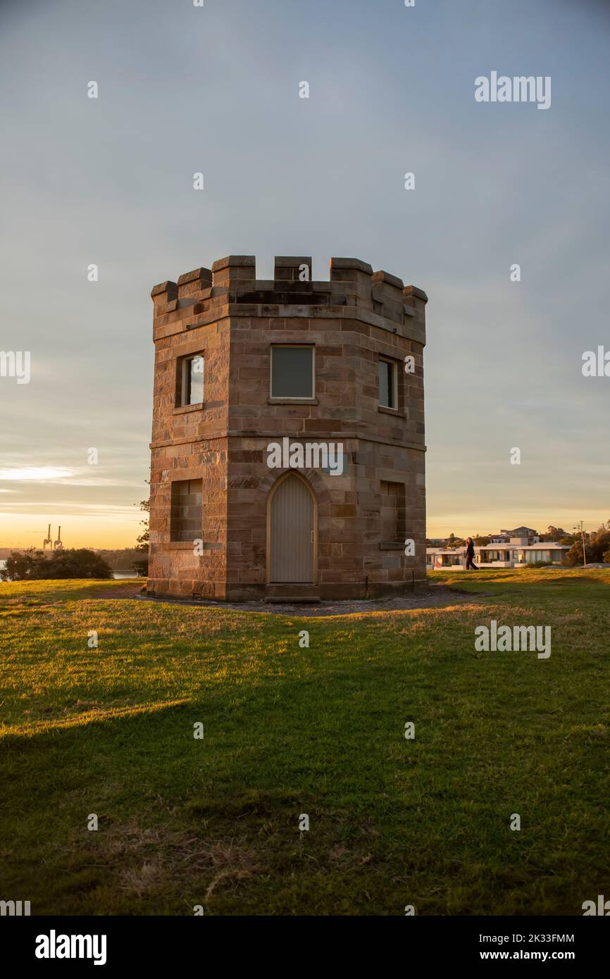 A barracks tower at the top of the hill with a cloudy sky Stock Photo ...