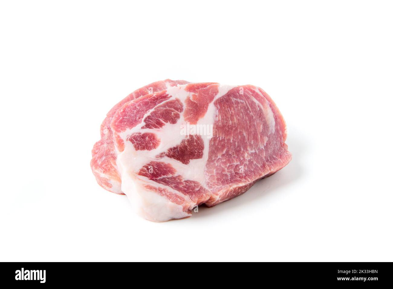 Pieces of pork meat, isolated on white, raw fresh pork neck meat steaks ...