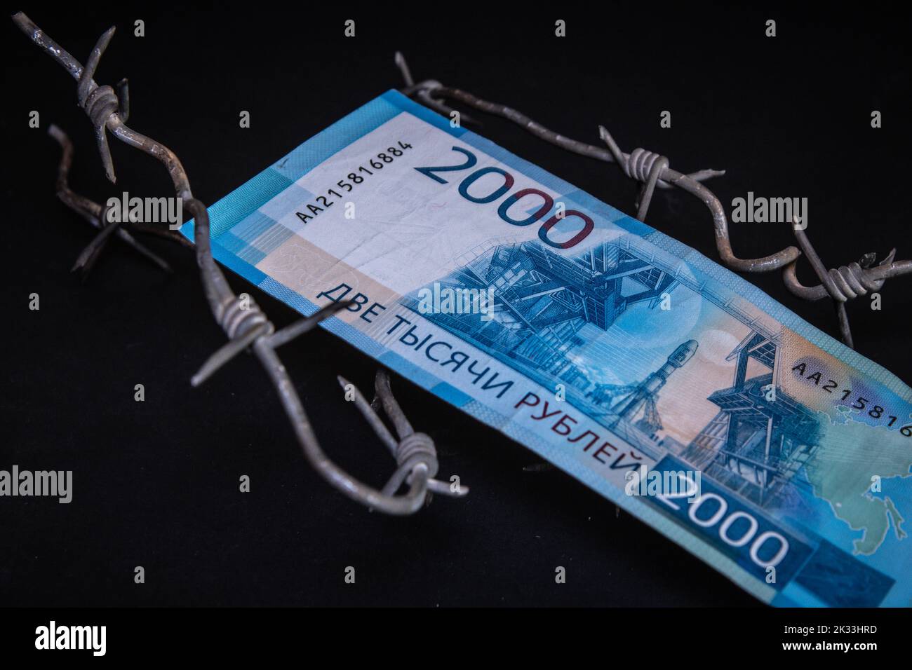 Russian Ruble with Barbed Wire, background economic crisis Stock Photo ...