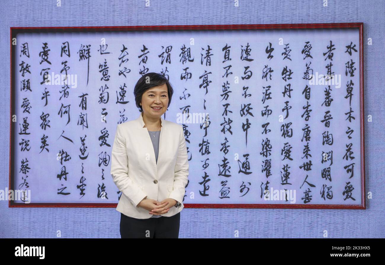 Secretary for Education Christine Choi Yuk-lin poses for pictures ...