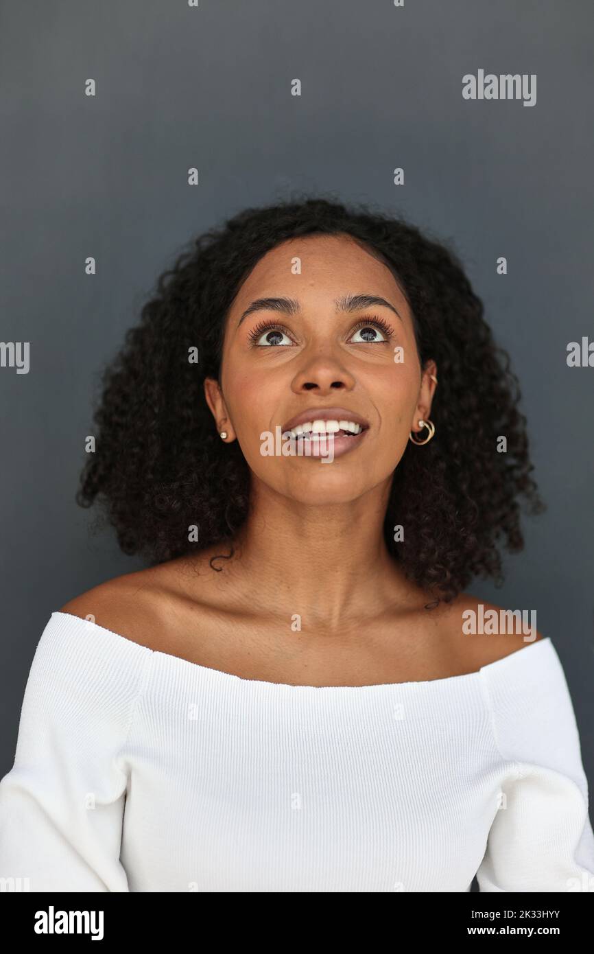 Happy business woman smiling inside office building Stock Photo - Alamy