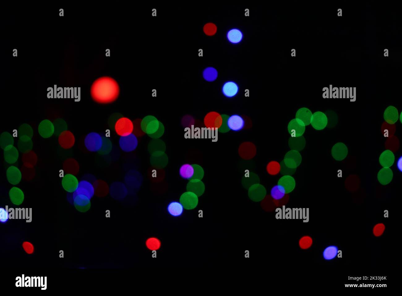 Colorful abstract lights blurred in night background Stock Photo - Alamy