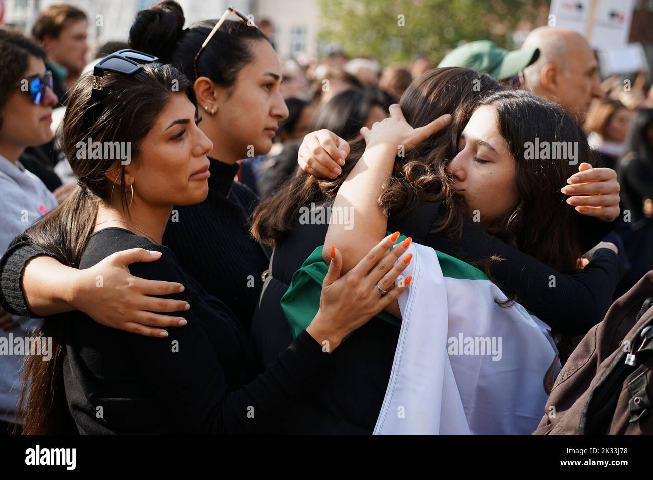 September 24, 2022, Copenhagen, Denmark: Young Iranian women comfort ...