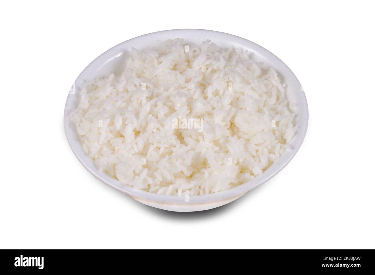 boiled rice Served in a bowl over white background. Selective focus ...