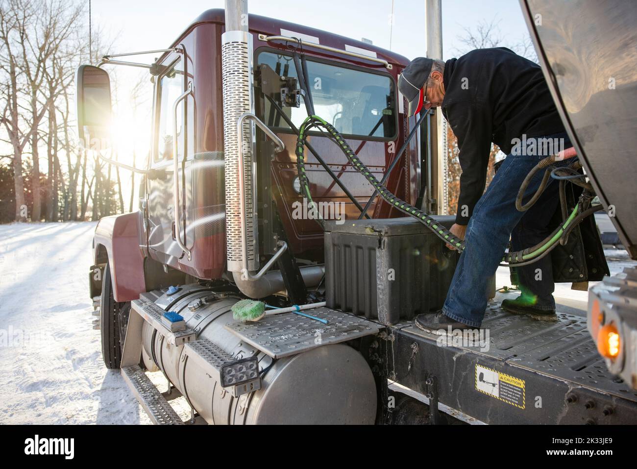 Milk tanker man hi-res stock photography and images - Alamy