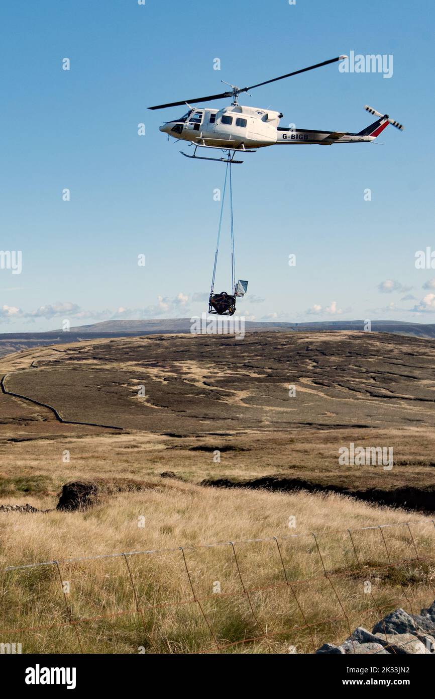 Heli-lift Services helicopter G-BIGB involved in peatland restoration ...