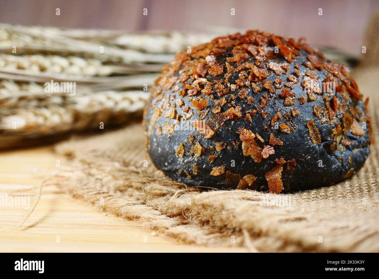 black color coconut bread on table Stock Photo - Alamy