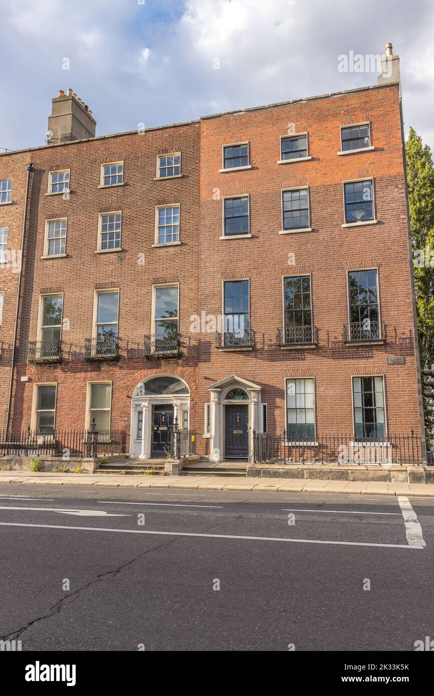 A vertical of a street of Merrion Square against Georgian buildings in ...
