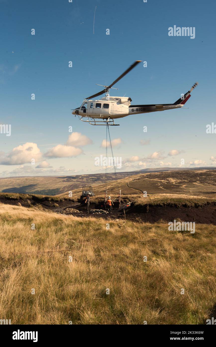 Heli-lift Services helicopter G-BIGB involved in peatland restoration ...