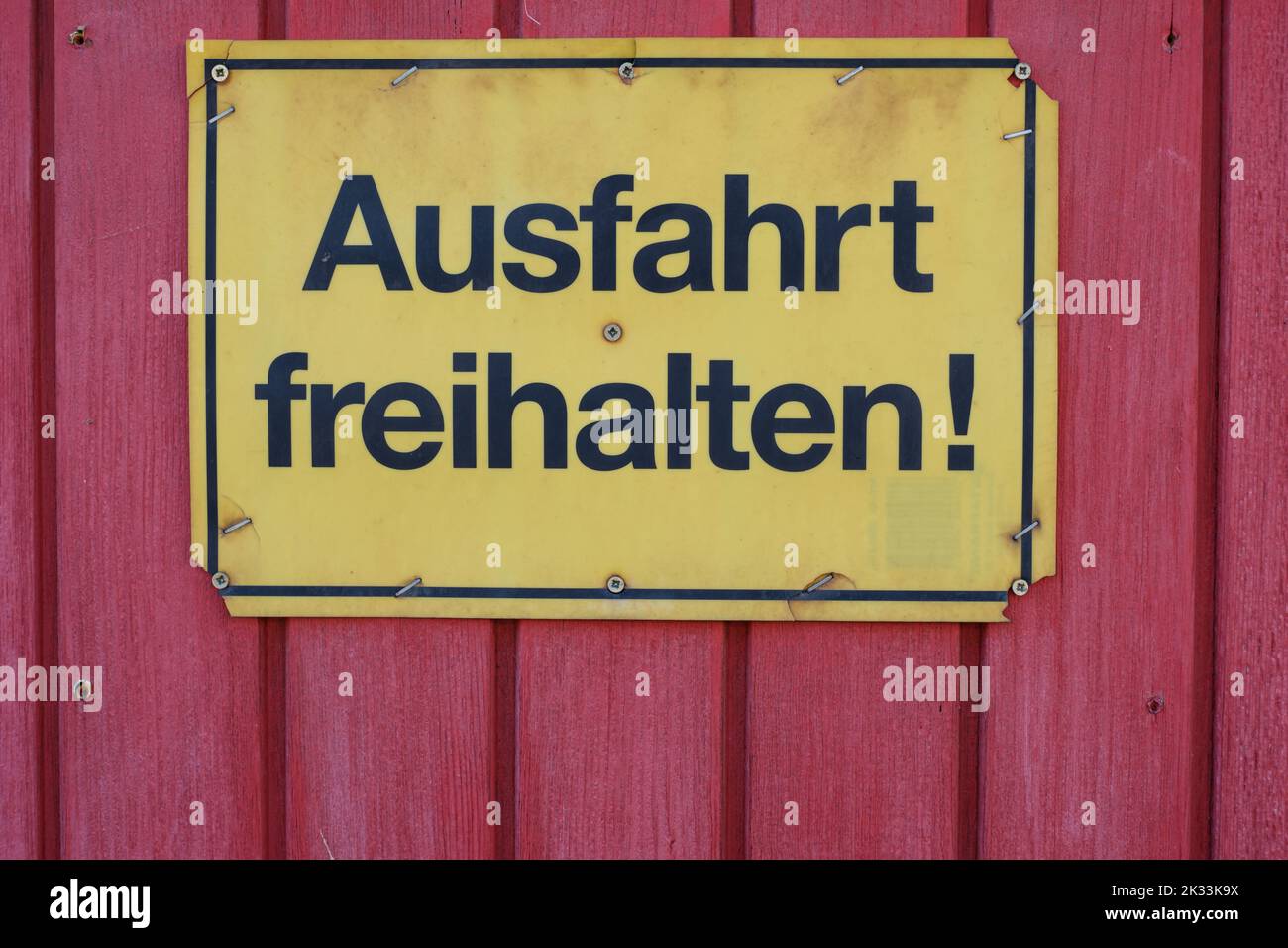 German sign ausfahr freihalten means keep clear on pink color Stock ...