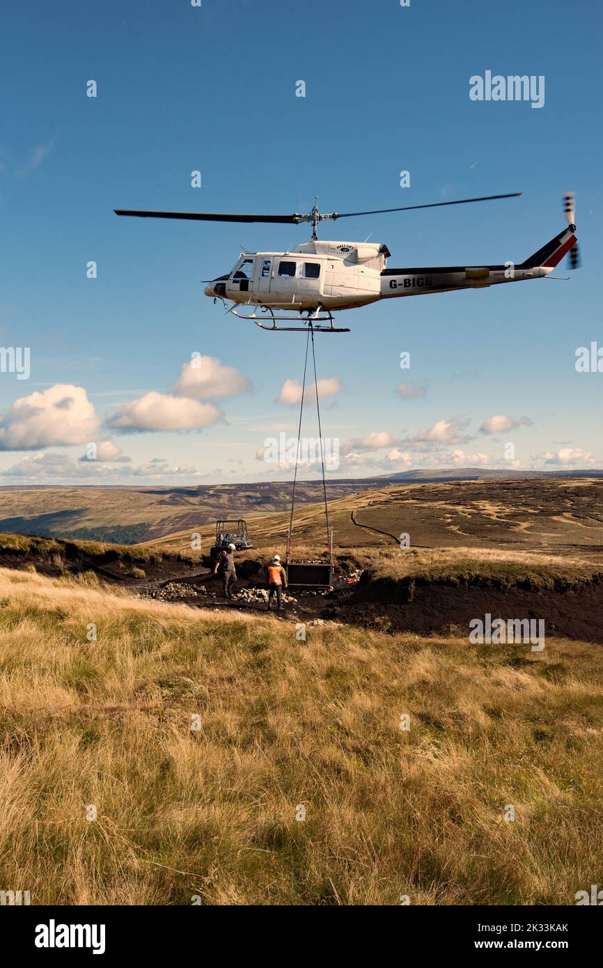 Heli-lift Services helicopter G-BIGB involved in peatland restoration ...