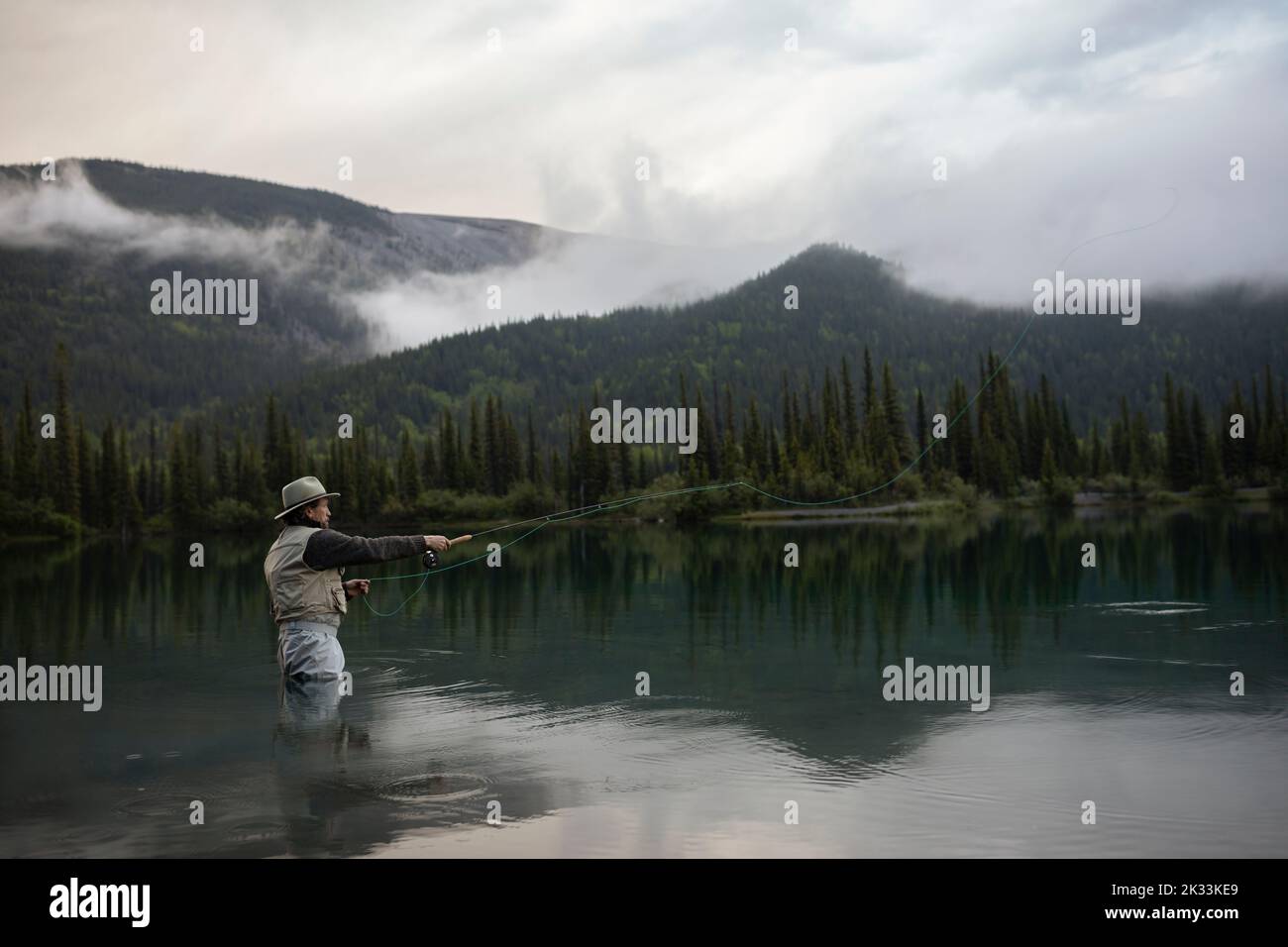 Fishing in pond hi-res stock photography and images - Alamy