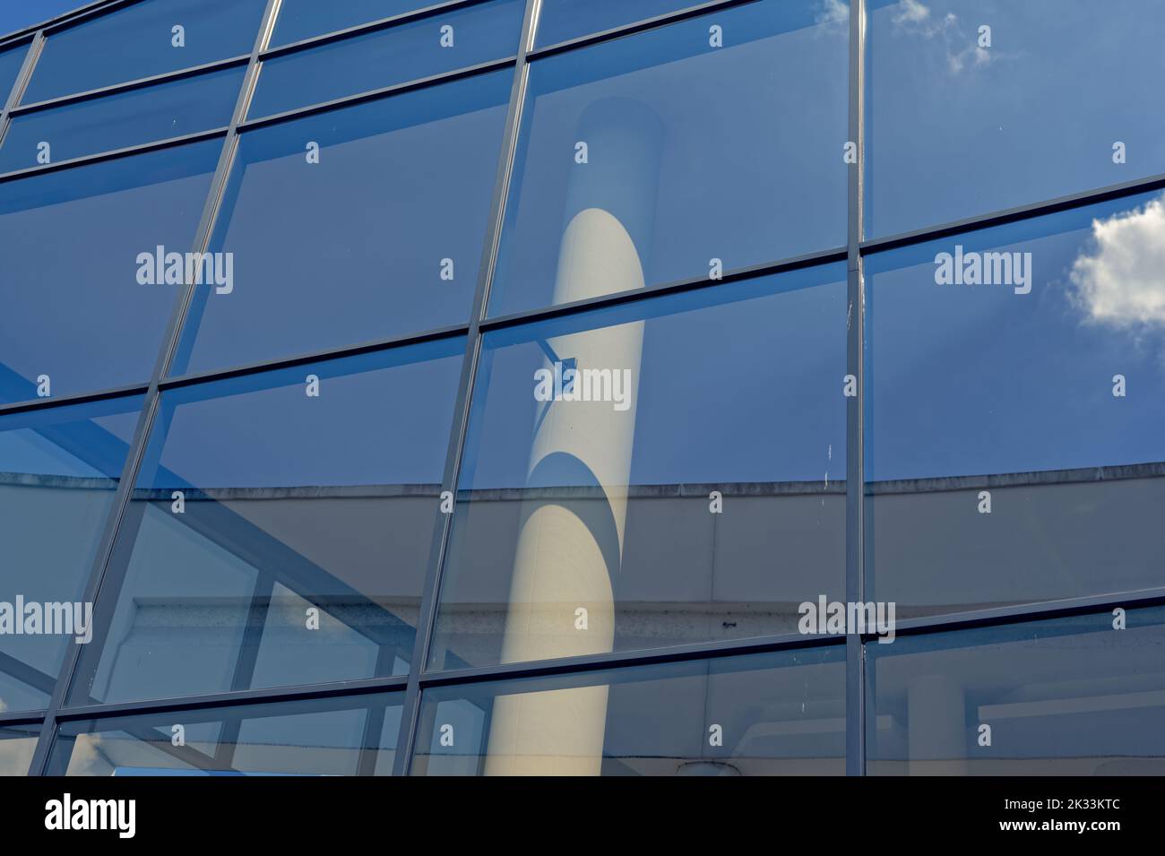 Facade details with large windows and reflection Stock Photo - Alamy