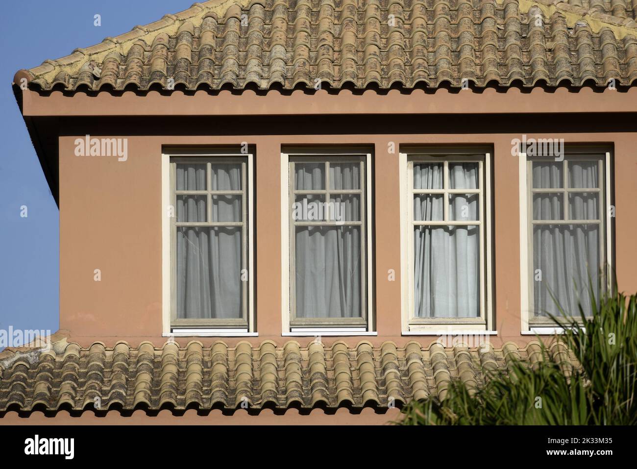 Old Neoclassical mansion exterior with a Venetian stucco wall, clay ...