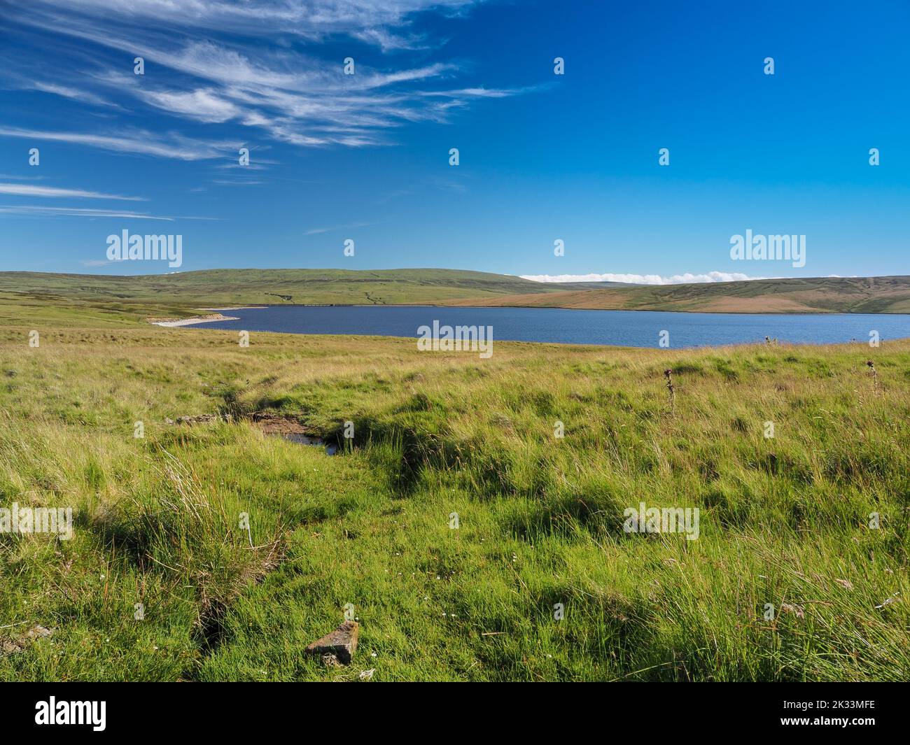 Cow Green Reservoir and dam, on the River Tees, wispy clouds, North ...