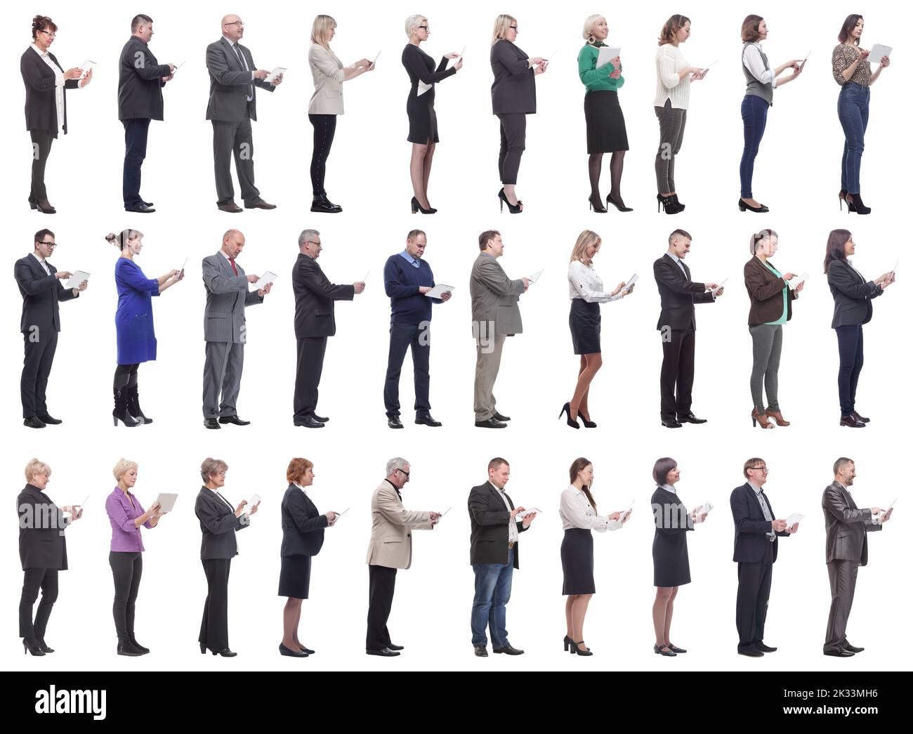 group of people holding tablet and looking ahead Stock Photo - Alamy