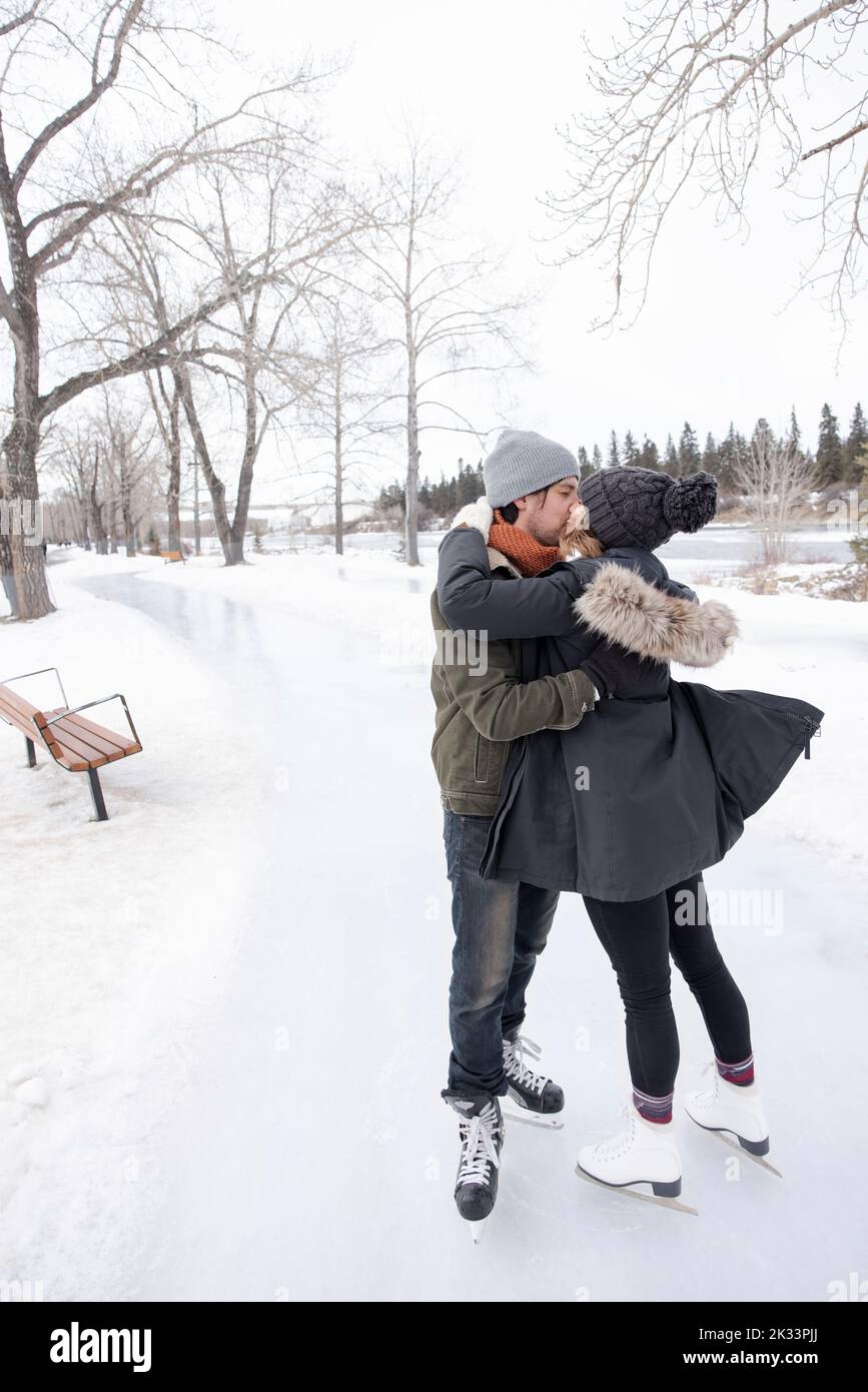 Affectionate couple kissing hi-res stock photography and images - Alamy
