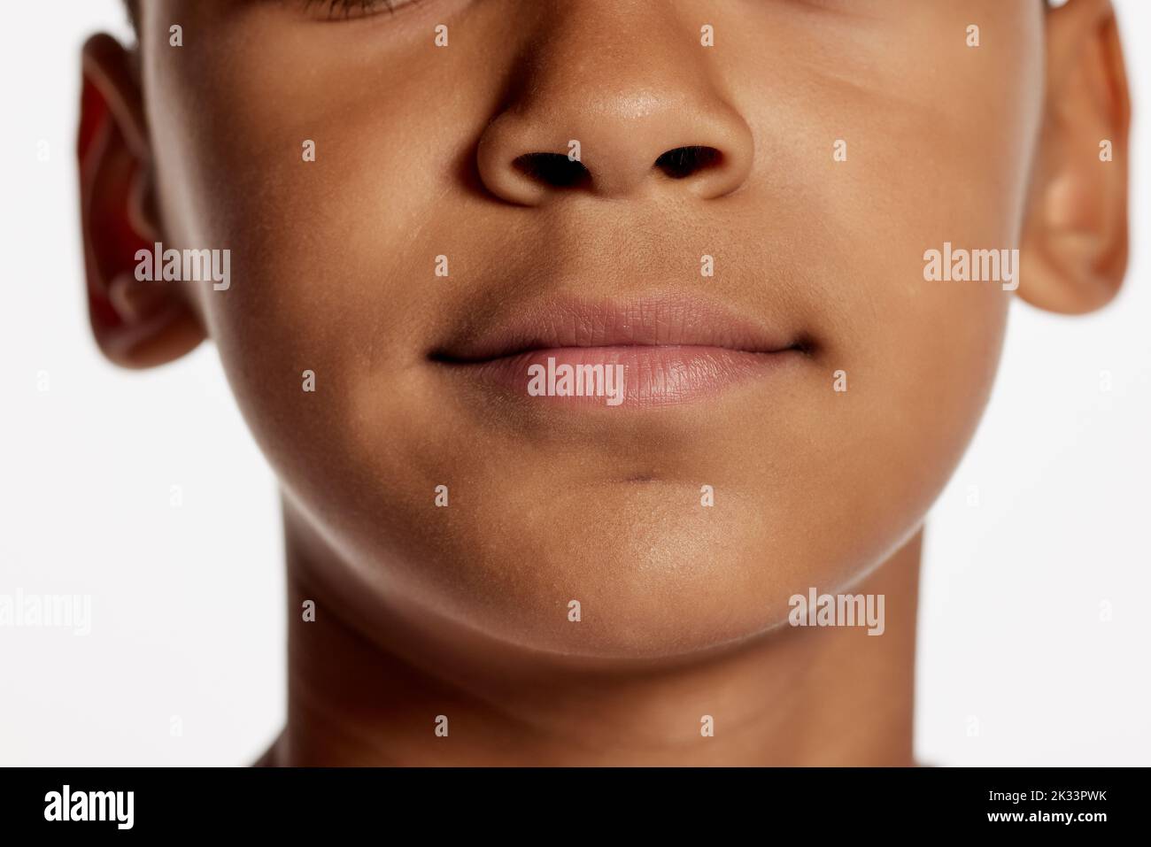 Cropped image of little boy face. Macro, close up parts of face. Chin ...