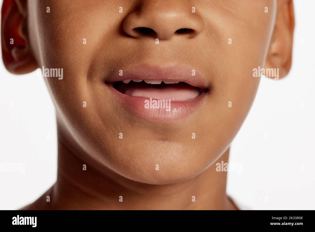 Cropped image of little boy face. Macro, close up parts of face. Chin ...