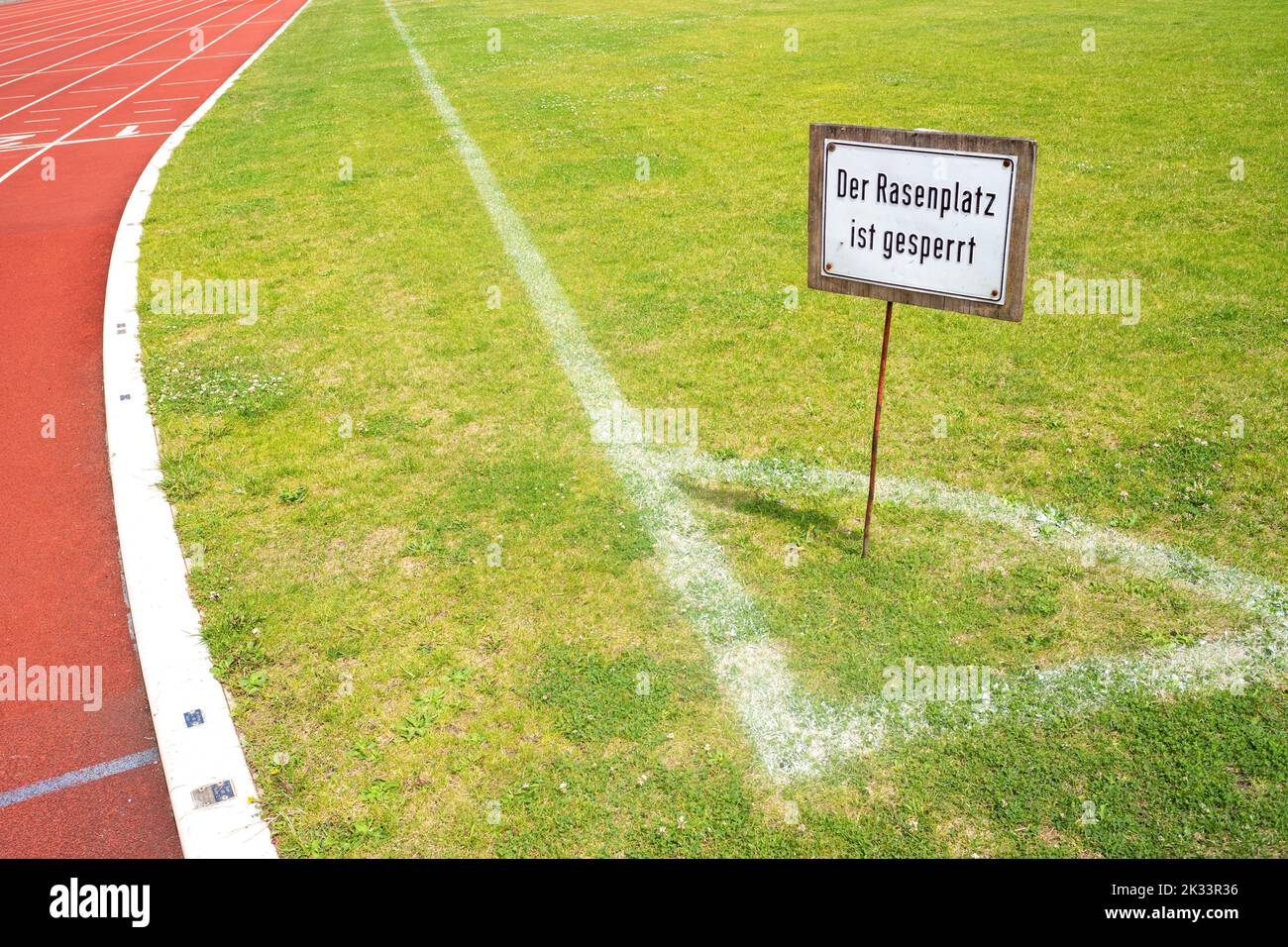 the lawn is closed sign in a running stadium Stock Photo - Alamy