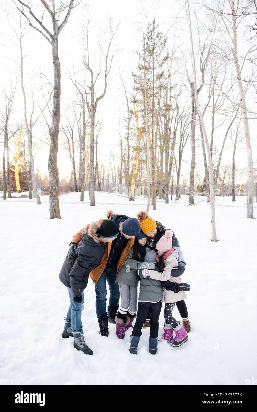 Family group hugging hi-res stock photography and images - Alamy