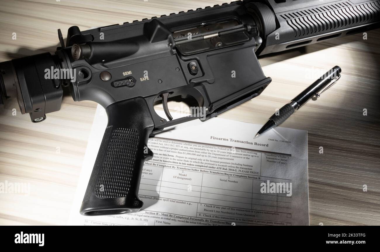 AR-15 and public domain background check form for its purchase Stock ...