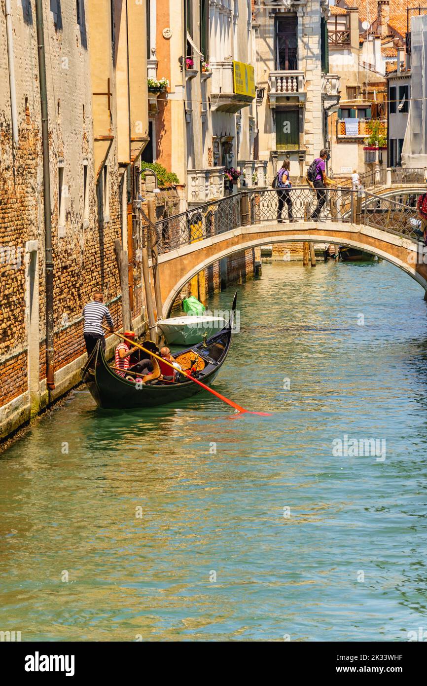 The tourist riding a gondola boat on the river Stock Photo - Alamy