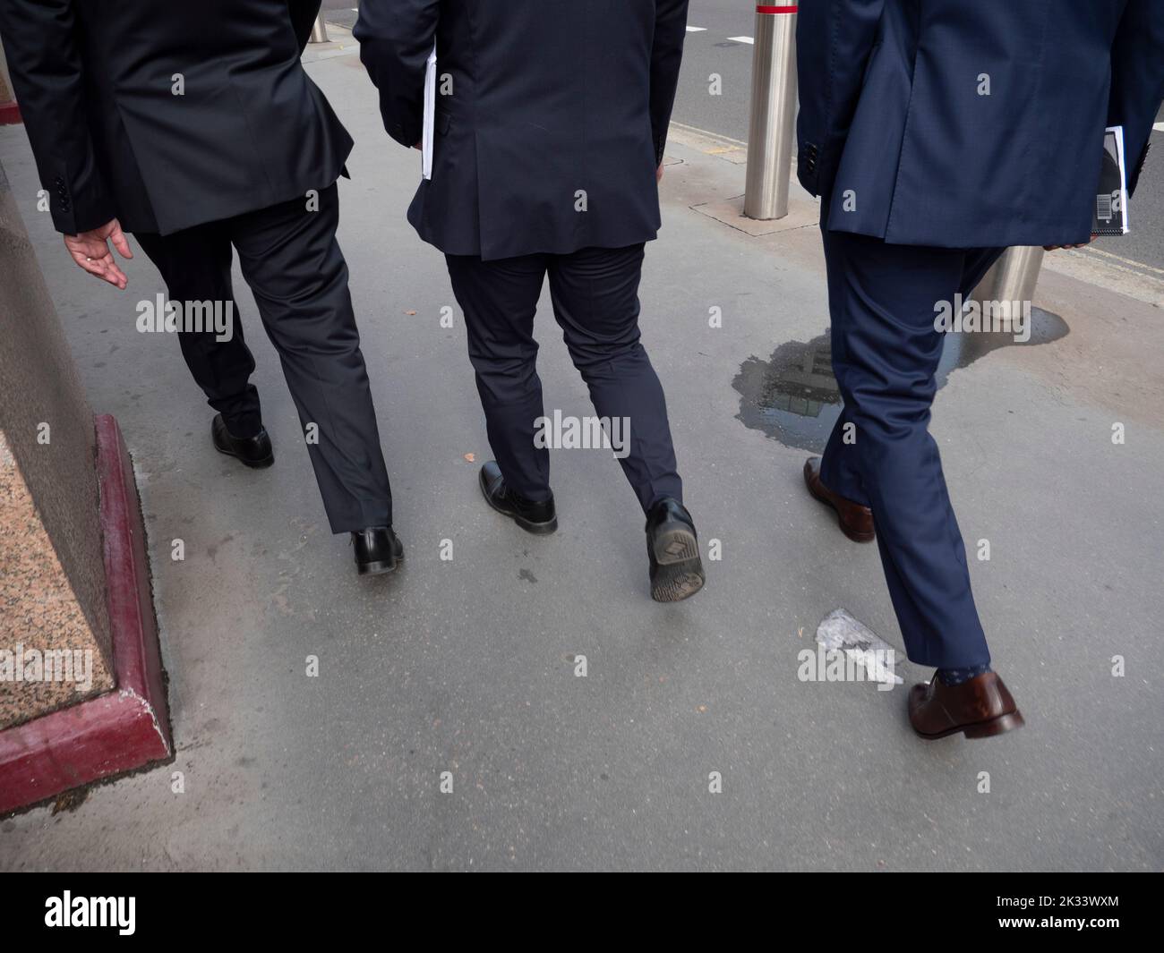 White collar workers in the City. Men in suits walking in the City of ...