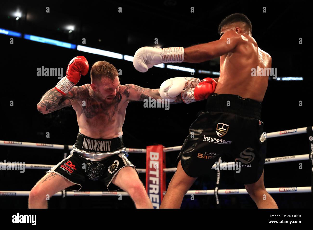 Dale Arrowsmith (left) and Mohammed Sameer in action during the ...