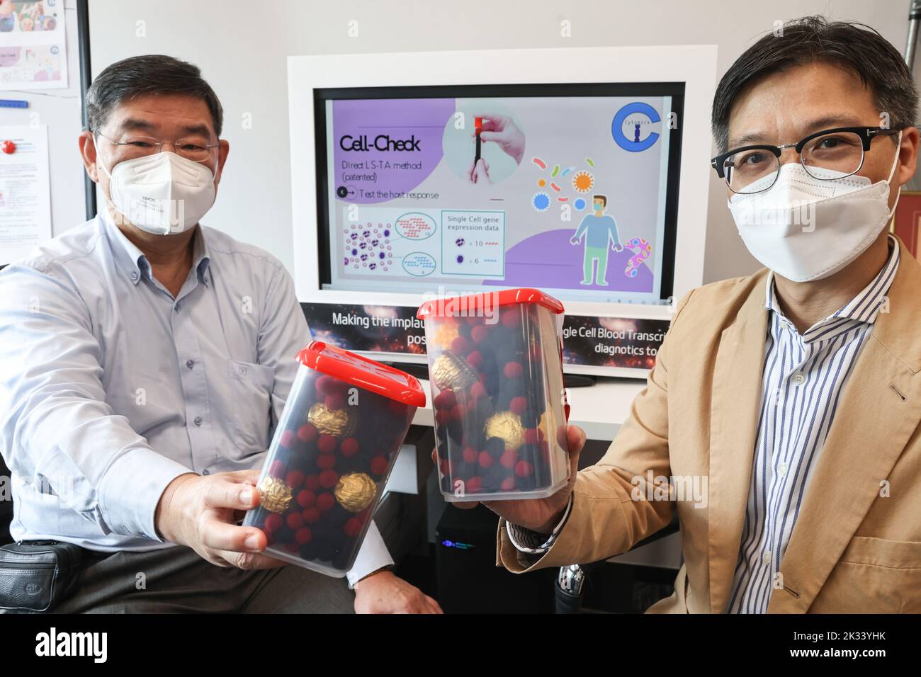 Leung Kwong-sak (left), Former Chairman of Computer Sciences and Nelson Tang Leung-sang ...