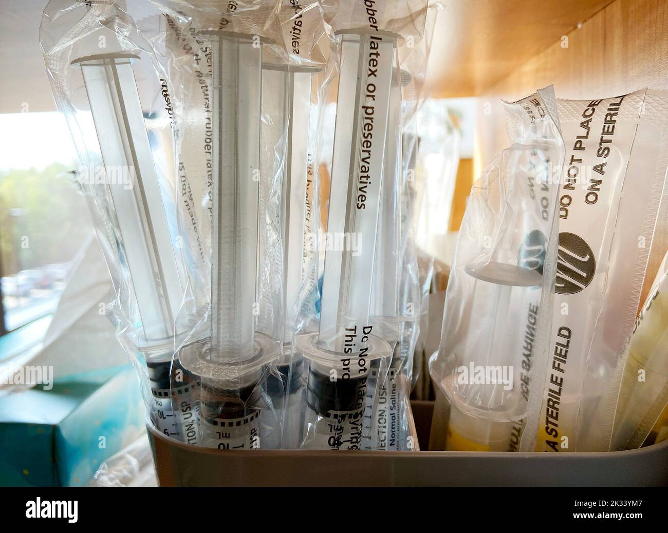 Dubuque, Iowa, USA. 21st Sep, 2022. Carole Schmidt, left undergoes ...