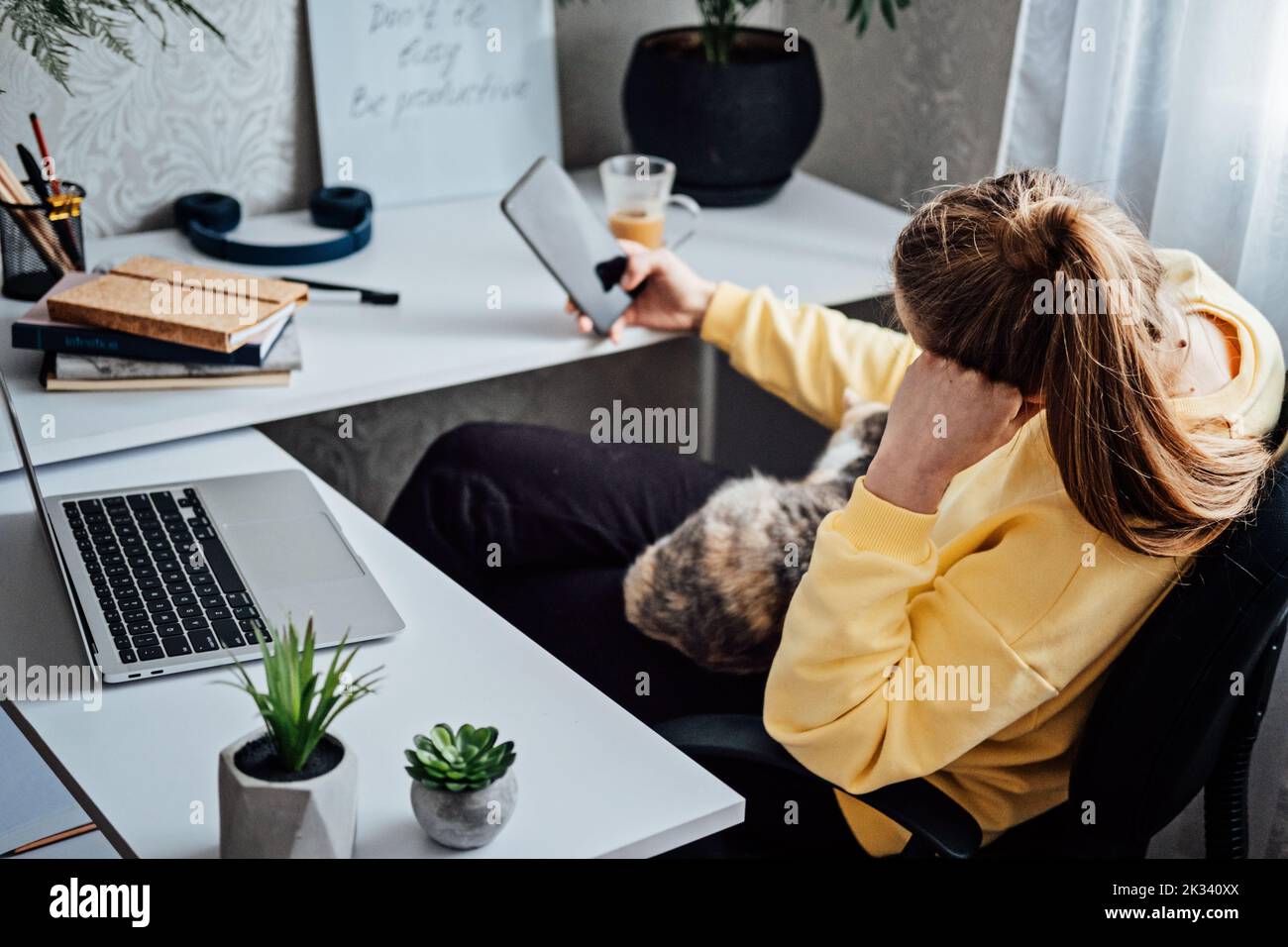 Woman freelance or procrastinate at workplace at home office. Self ...