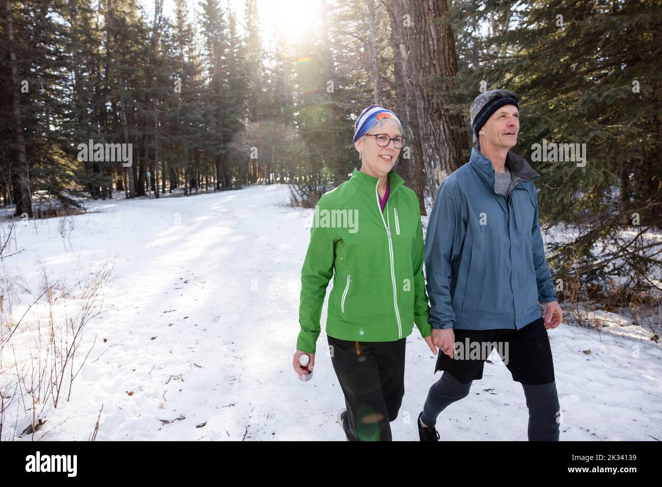 Walking through snowy forest hi-res stock photography and images - Alamy