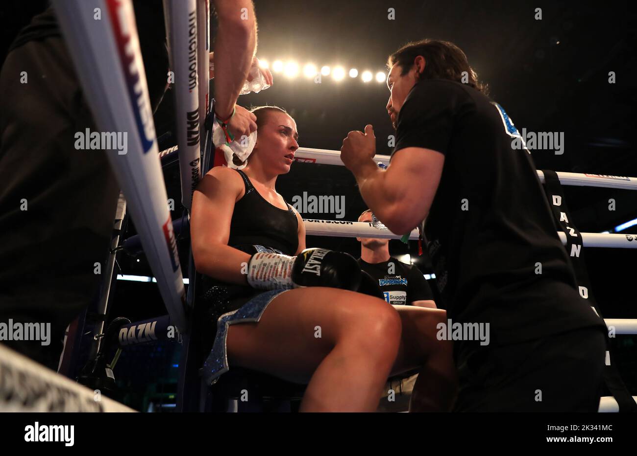 Rhiannon Dixon in her corner speaking to her coach during the ...