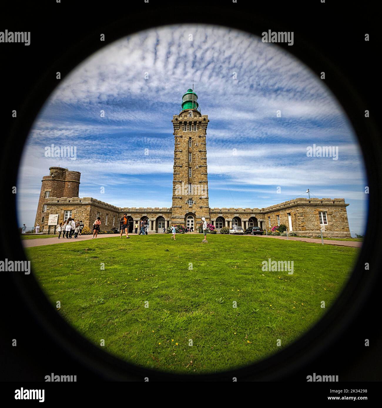 Cap Frehel lighthouse with tourists, Emerald Coast, Brittany, France ...