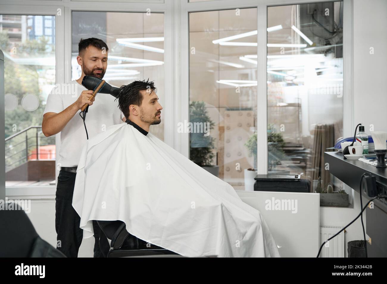 Hair salon worker hi-res stock photography and images - Alamy