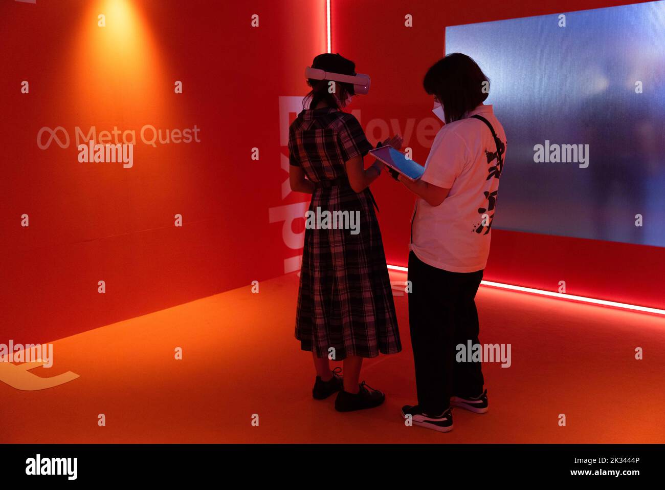 Female visitor of Tokyo Game Show 2022 tests the Meta Quest VR Hardware ...