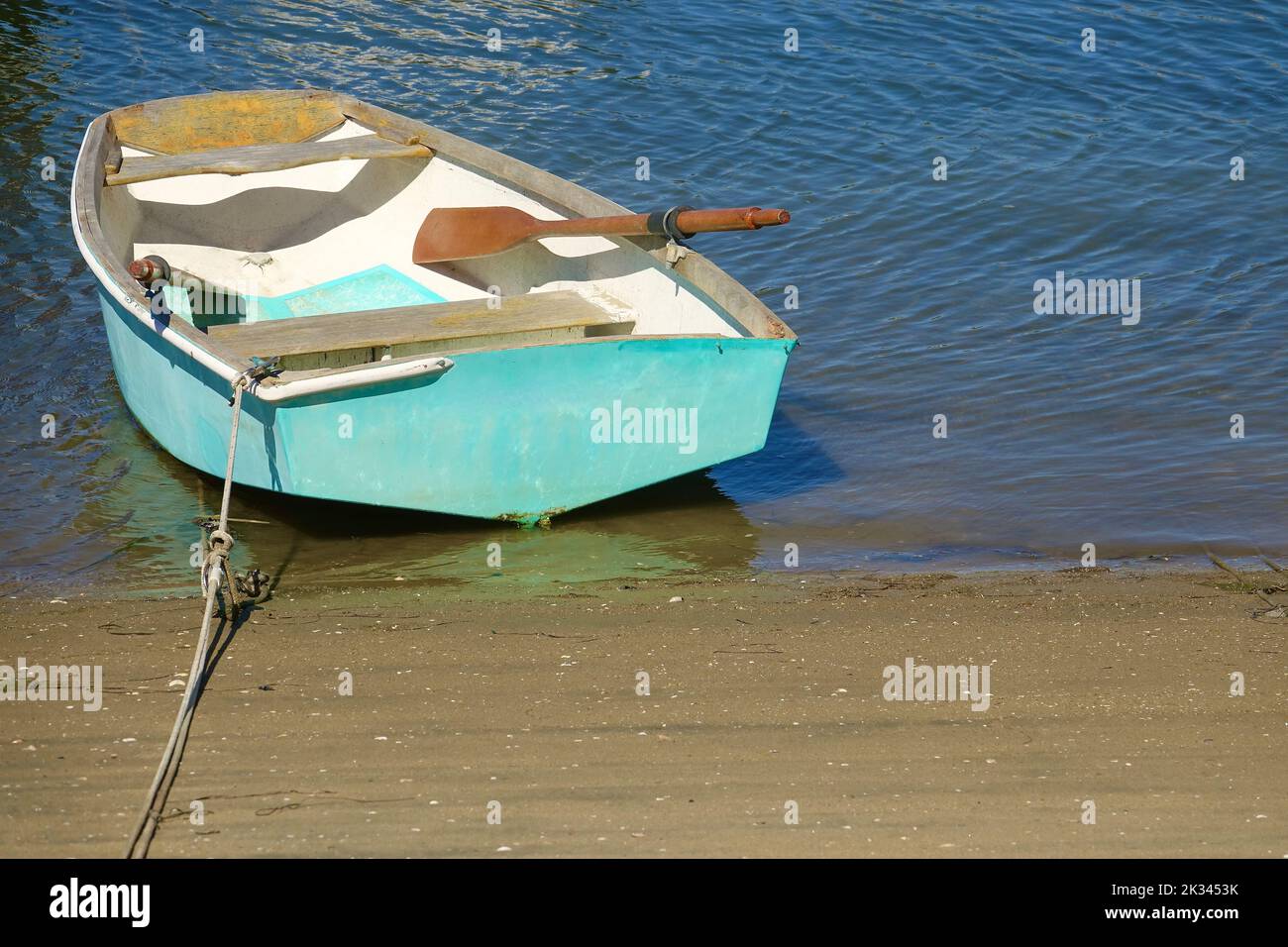 vintage wood row boat beached on the shore Stock Photo - Alamy