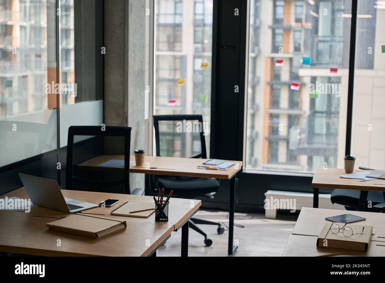 Contemporary interior of well-furnished office space with panoramic ...