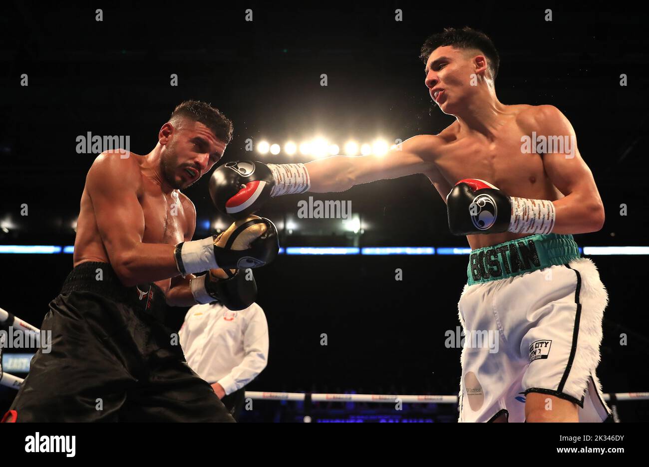 Junaid Bostan (right) in action against Anas Isarti in the Super ...