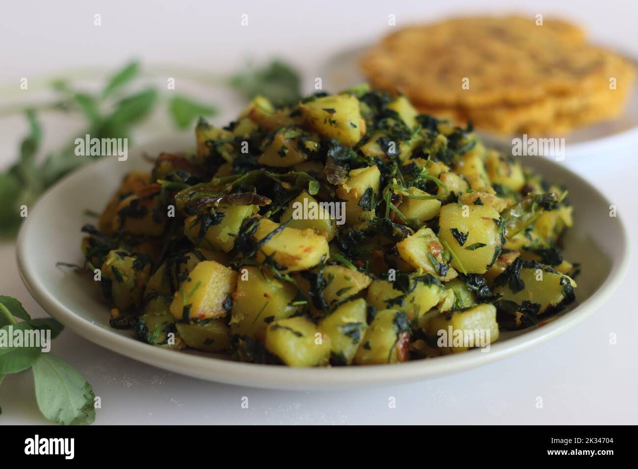 Aloo Methi served along with Makki ki roti. A healthy meal combination ...