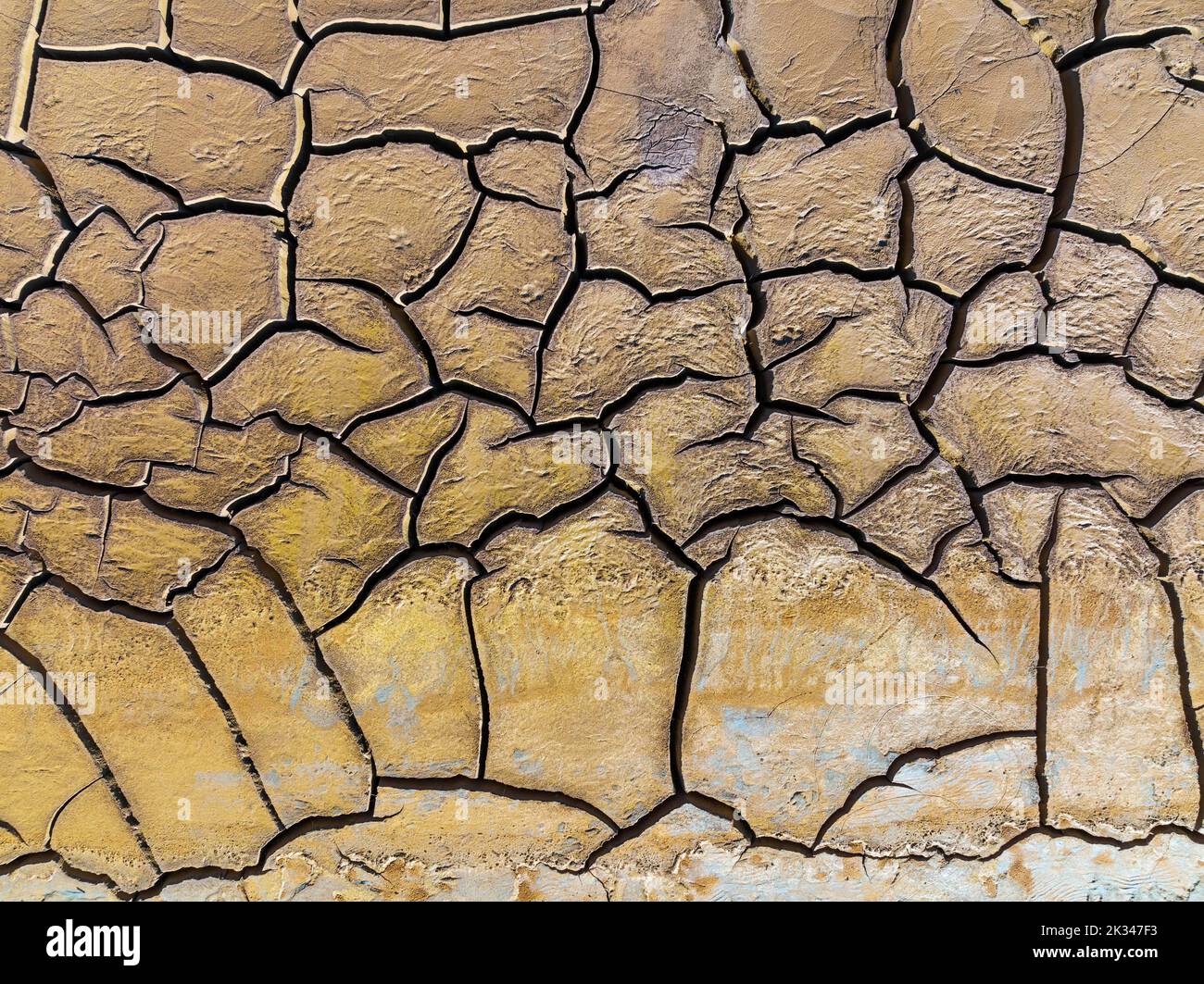 Mineral-rich cracked earth at the bank of the Rio Tinto (Red river ...